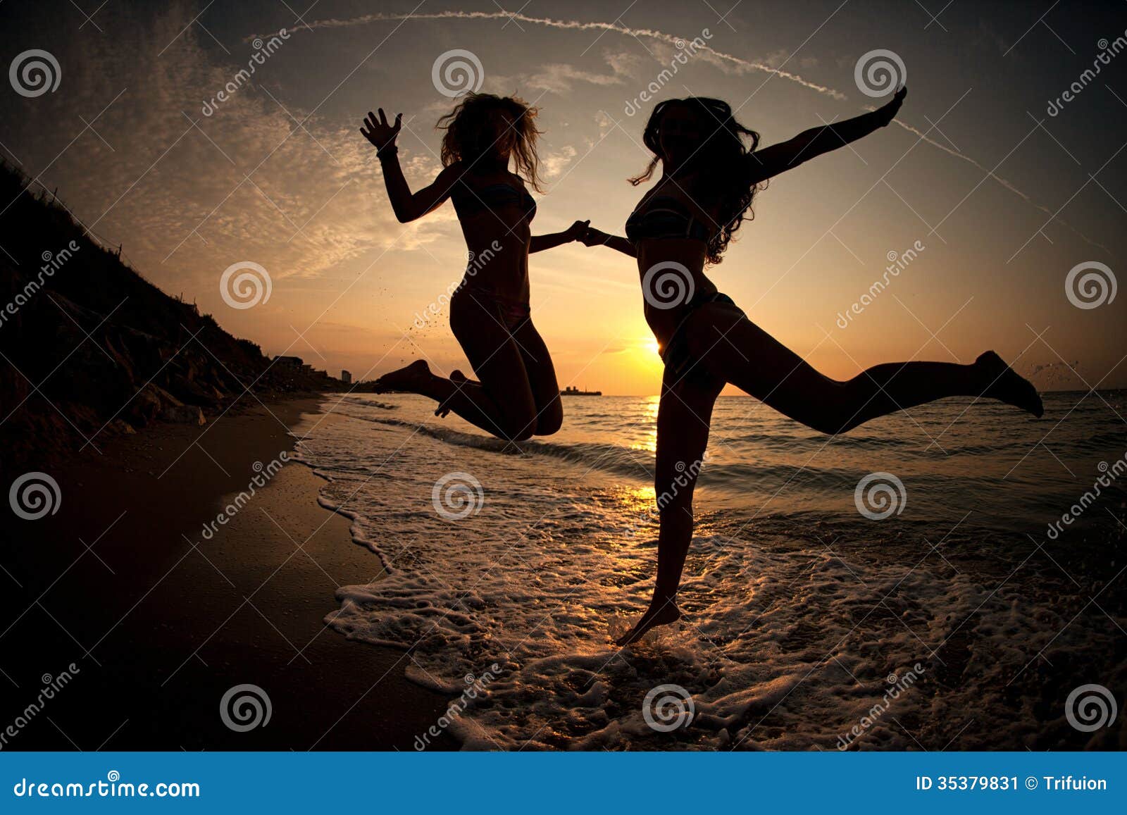 Girls DANCING in SUNSET on SEA Stock Image - Image of beacon, adult ...