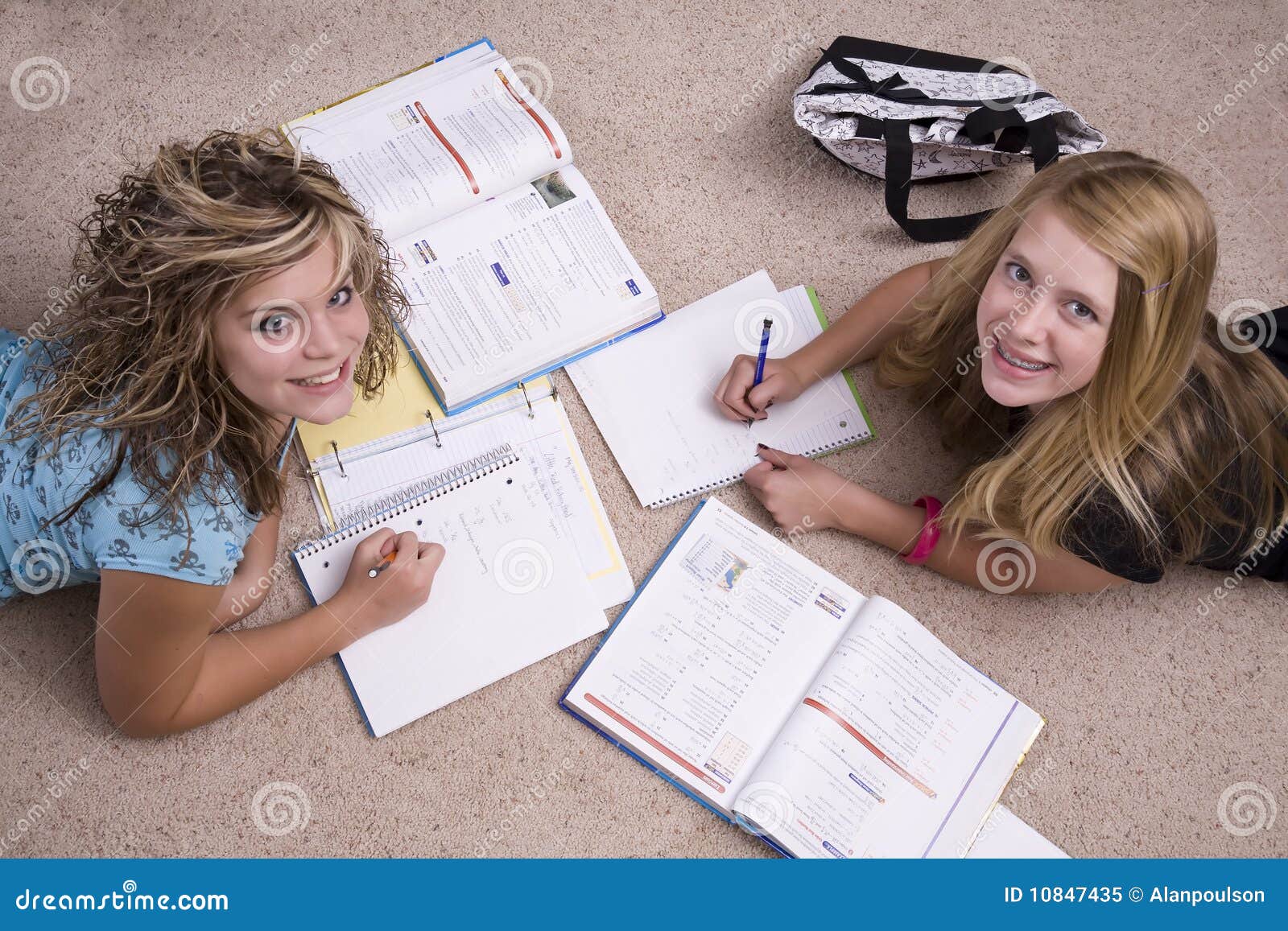 Girls Doing Homework Looking Up Stock Image - Image of pencil ...