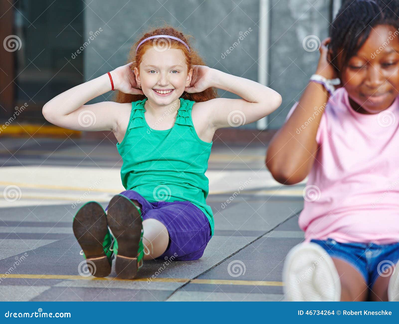 Girls Doing Sit-ups in Physical Education Stock Photo - Image of child ...