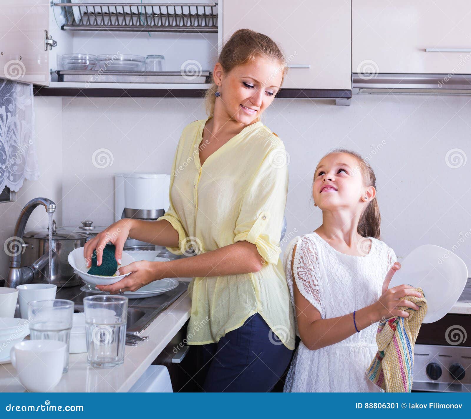 Girls Doing and Wiping Dishes in Kitchen Stock Image - Image of adult ...