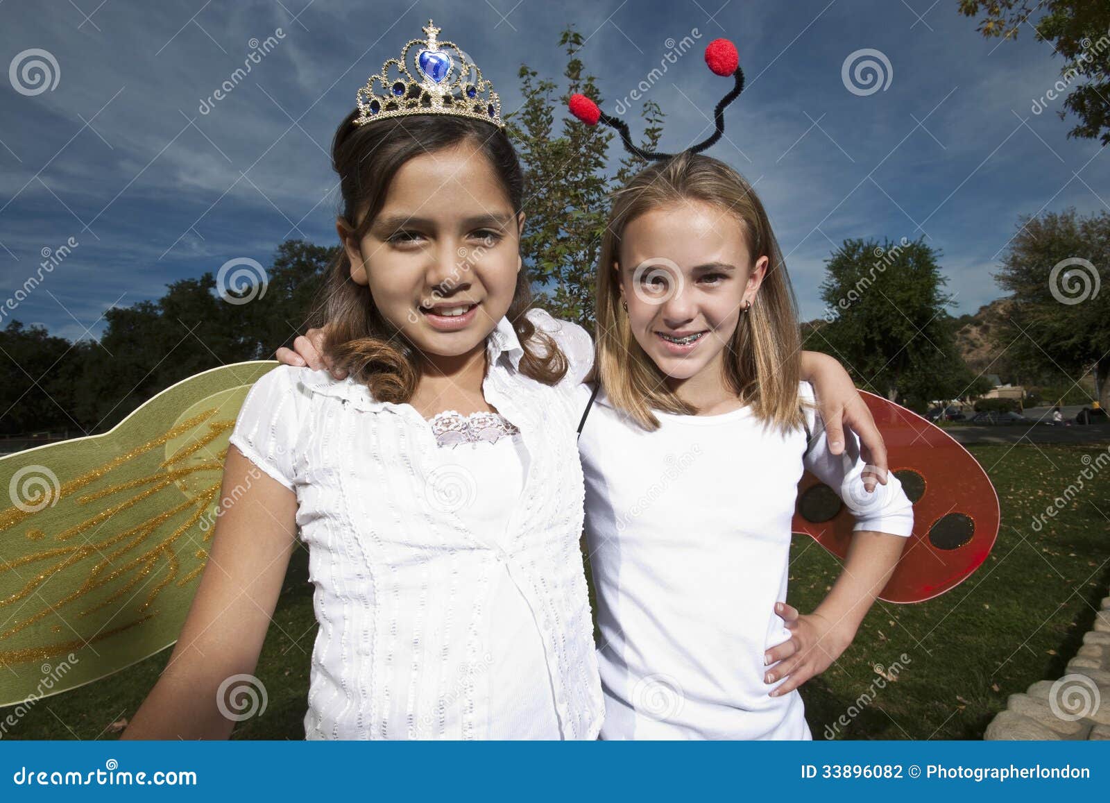Girls Dressed As Ladybug and Angel Stock Photo - Image of childhood ...