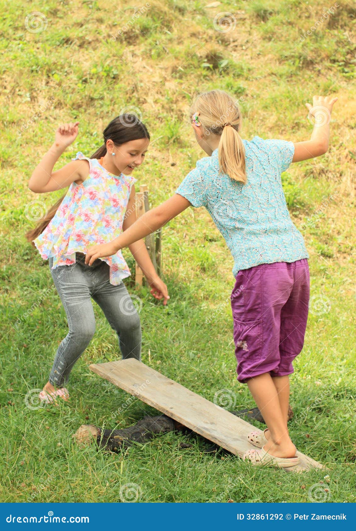 Girls falling from a swing stock photo. Image of girl - 32861292