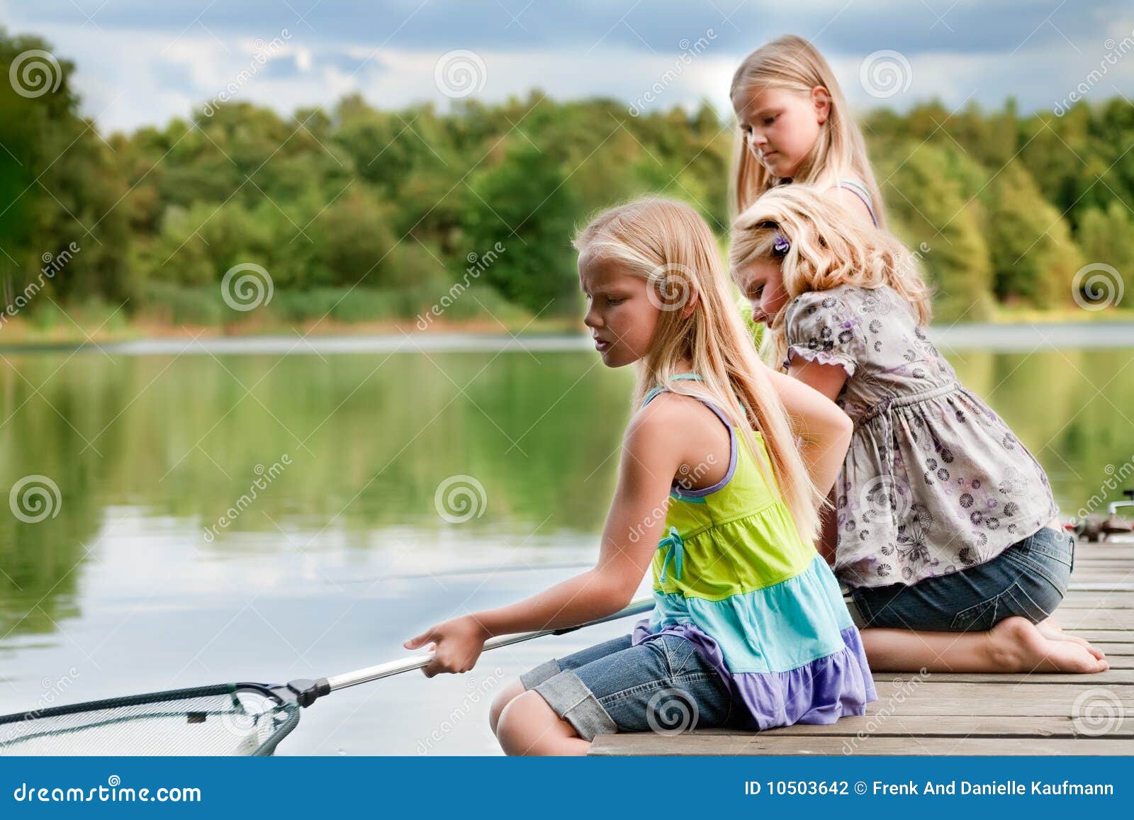 The girls are fishing stock photo. Image of sitting, sunny - 10503642