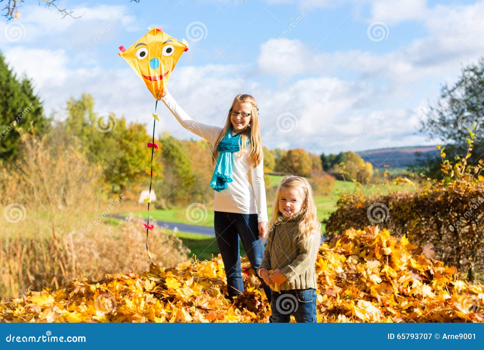Girls Fly an Kite in Fall or Autumn Park Having Fun Stock Image - Image ...