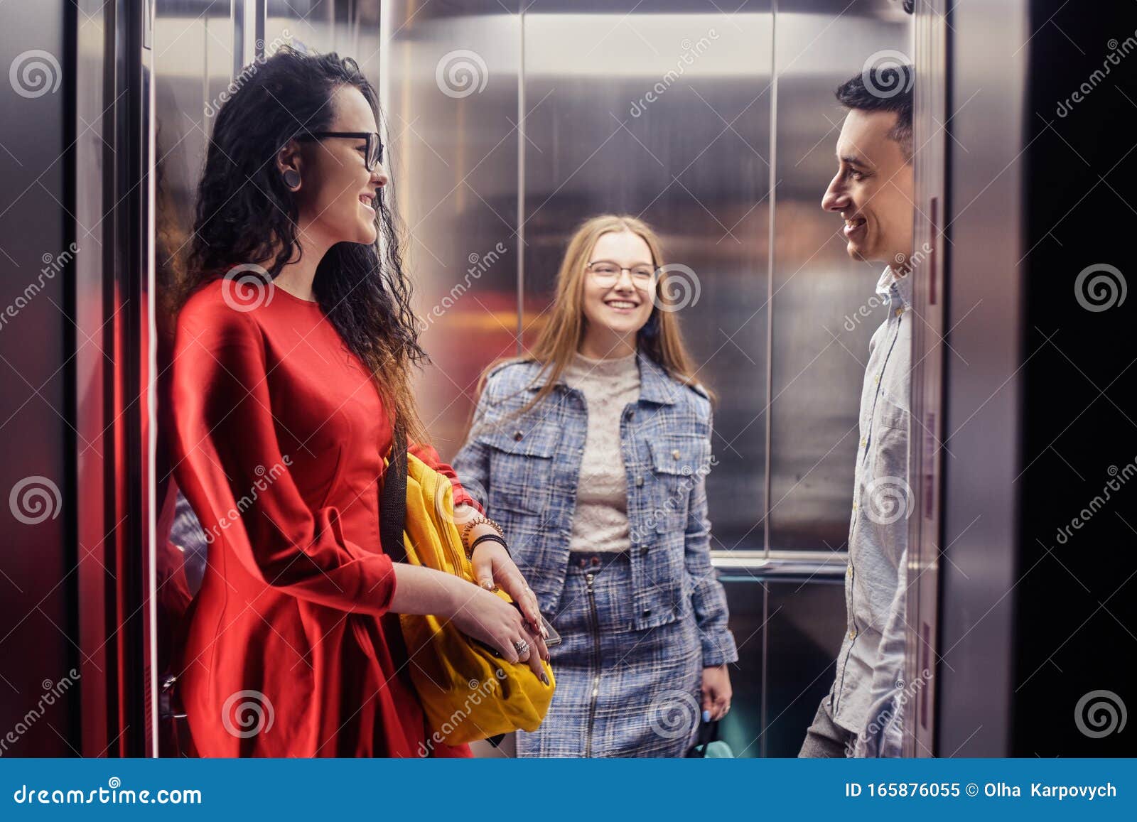 The Girls and the Guy Ride in the Elevator. Students in the Elevator Go ...