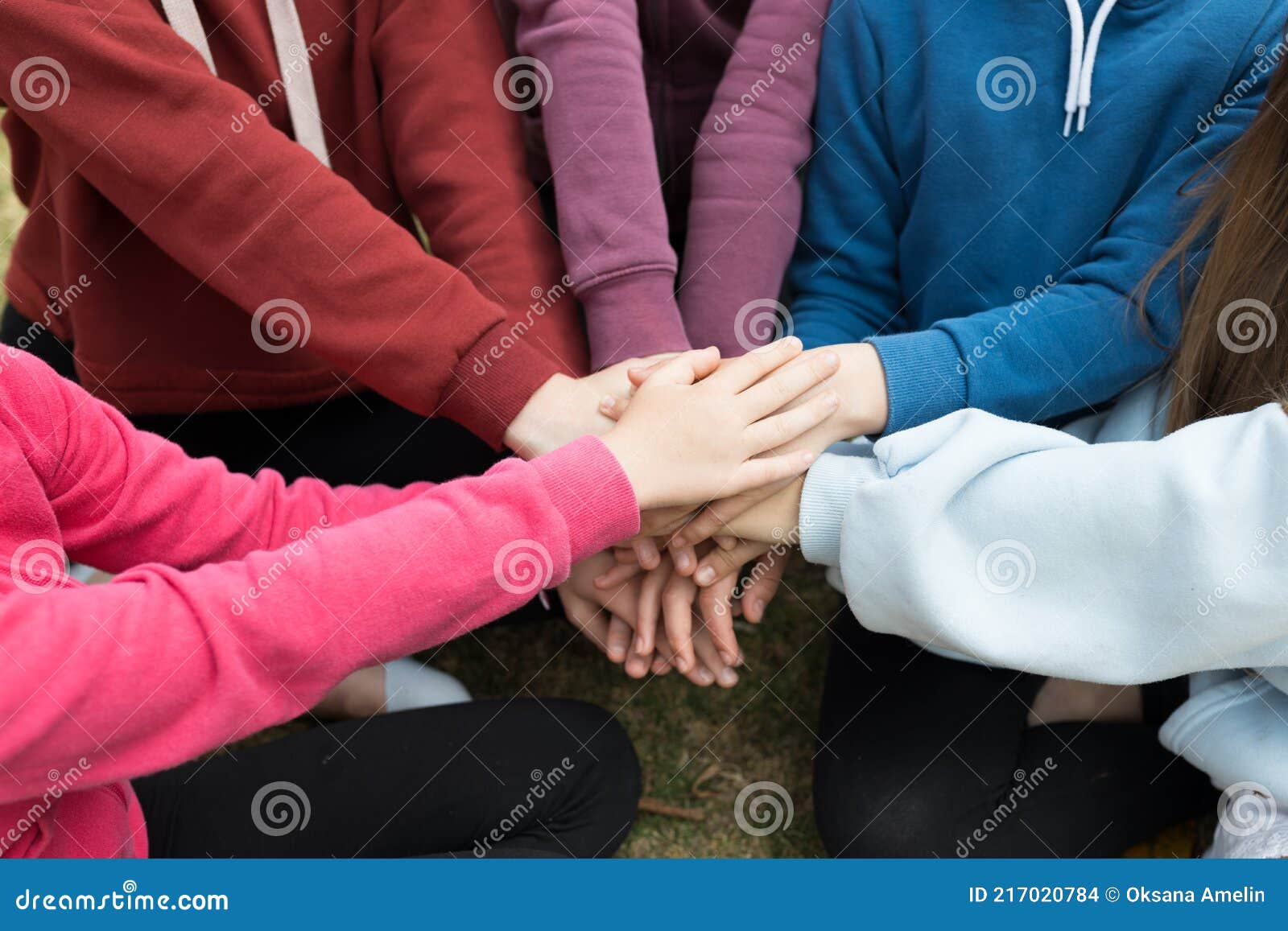 Girls hands showing unity stock photo. Image of connection - 217020784