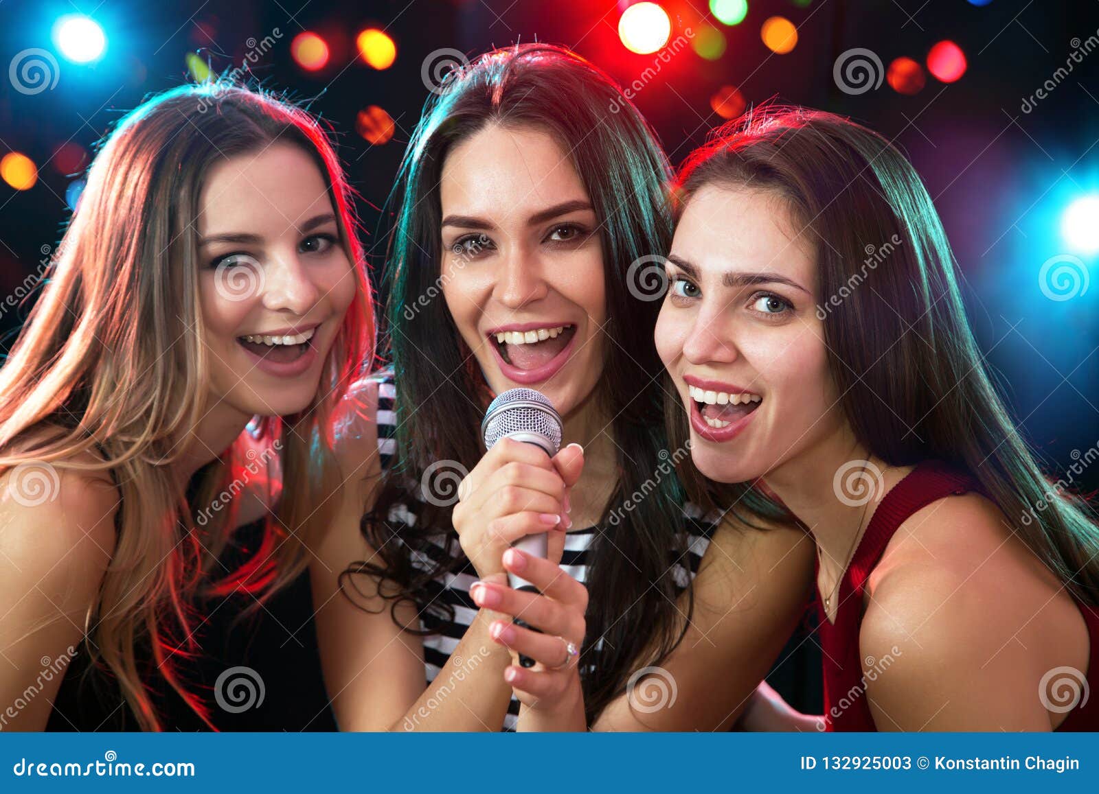 Girls Having Fun Singing at a Party Stock Image - Image of holidays ...