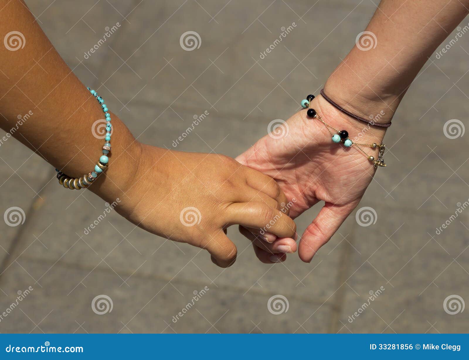 Two Girls Holding Hands On Hike Stock Image | CartoonDealer.com #216371389