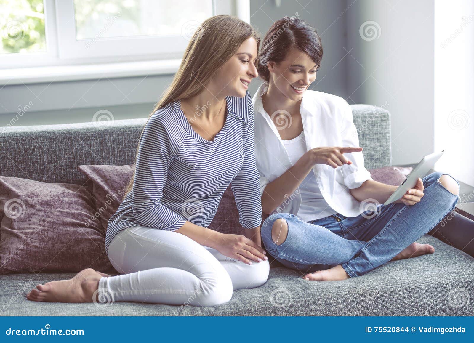 Girls at home stock photo. Image of news, family, home - 75520844