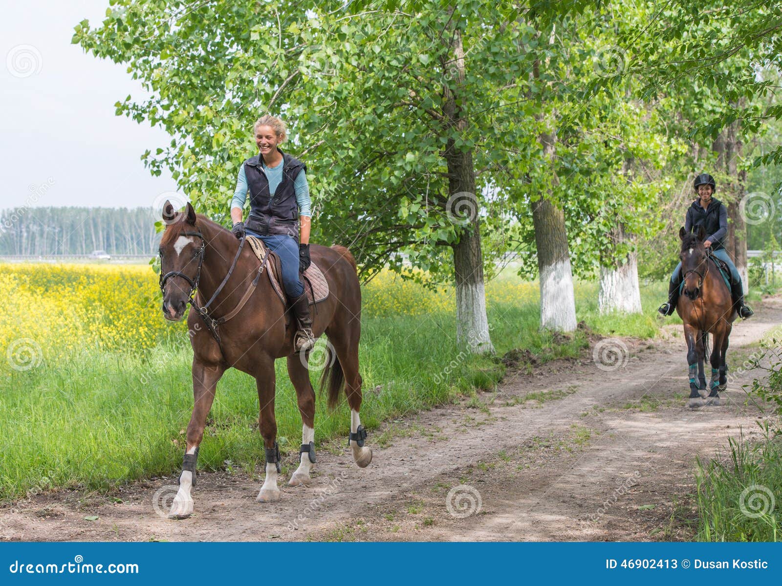 Girls on horseback riding stock image. Image of rural - 46902413