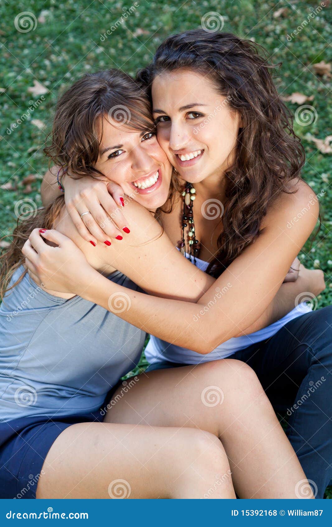 Girls Hugging stock photo. Image of horizontal, park - 15392168