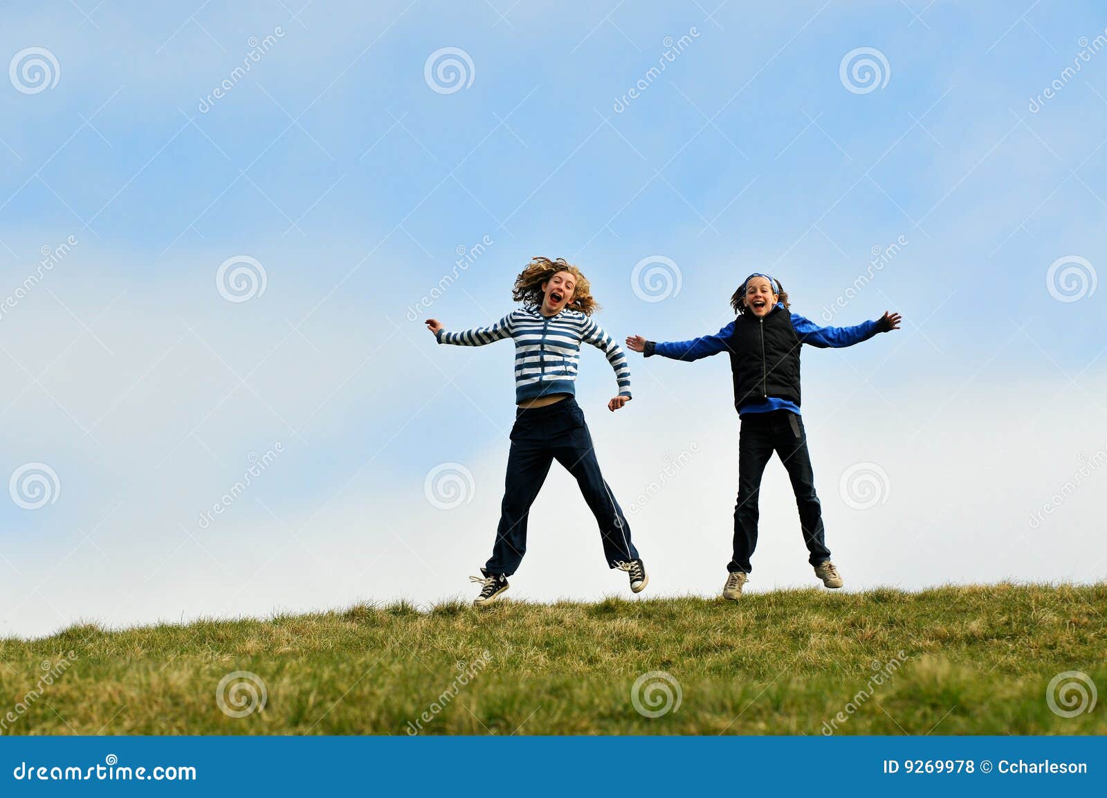 Girls jumping for joy stock photo. Image of outdoors, carefree - 9269978