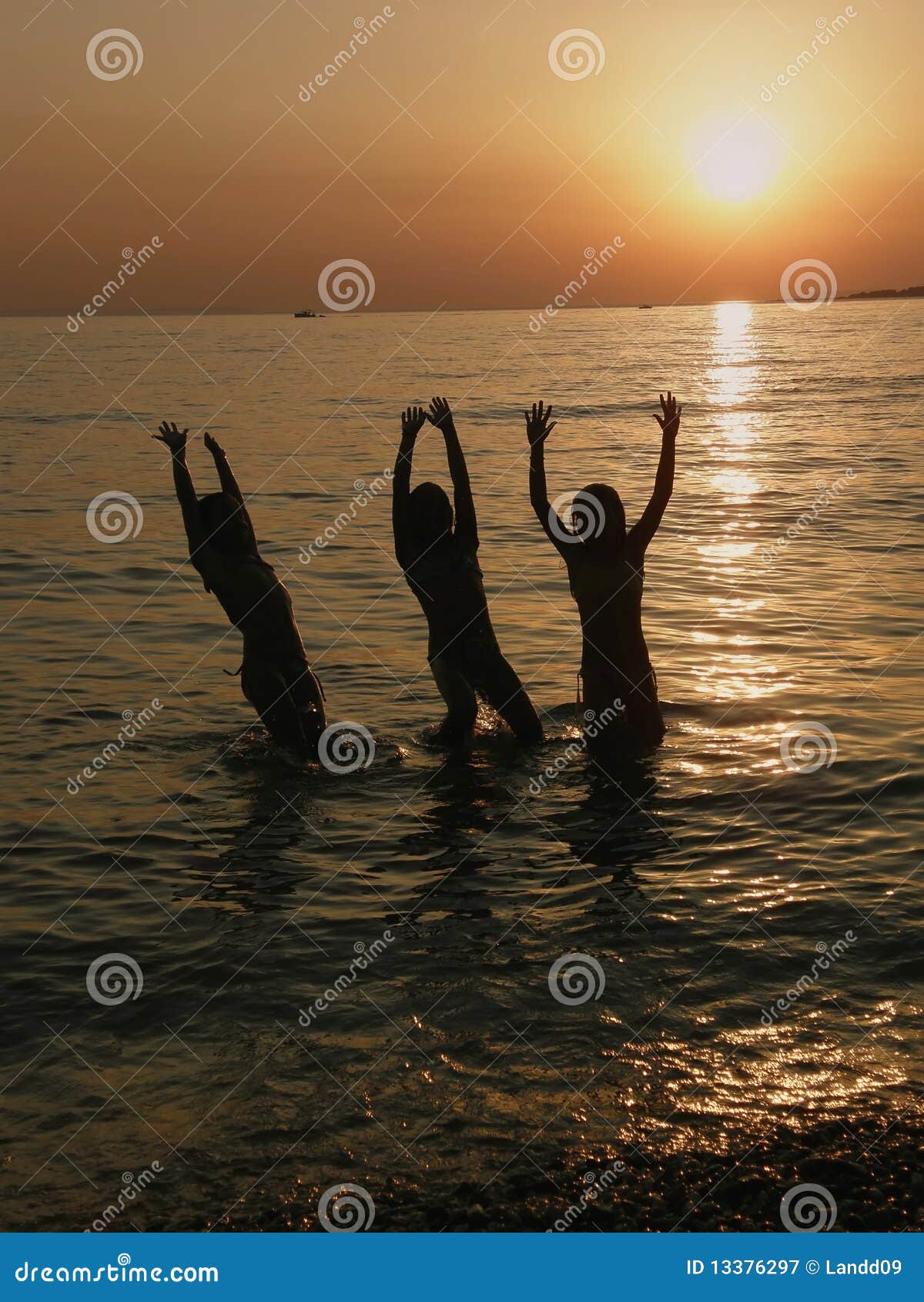 Girls Jumping in the Sea in Sunset Stock Image - Image of camp, enjoy ...
