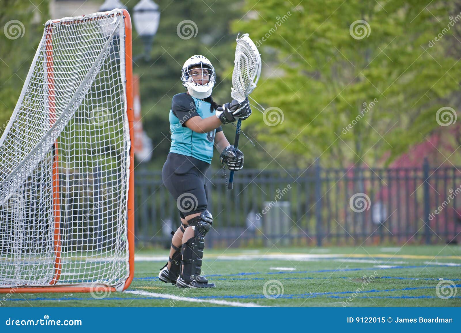 Girls lacrosse goalie stock image. Image of uniform, field - 9122015