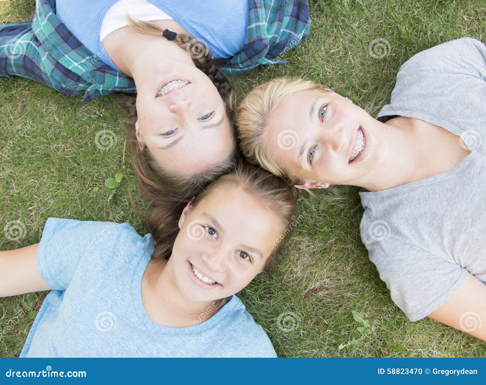 Girls Looking up stock photo. Image of girls, green, friends - 58823470