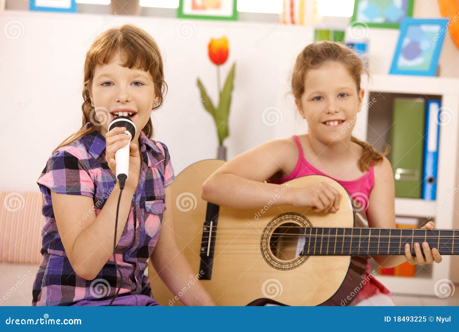 Girls performing music stock image. Image of elementary - 18493225