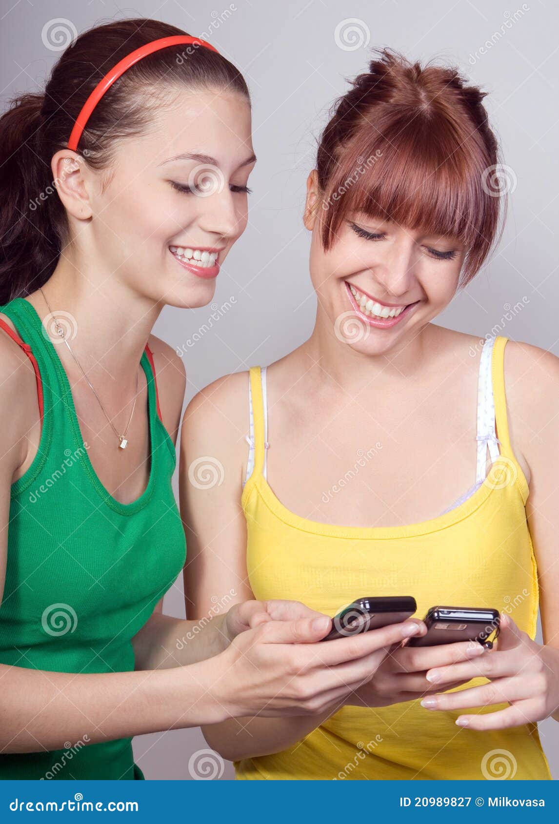 Girls with phone stock image. Image of beautiful, females - 20989827