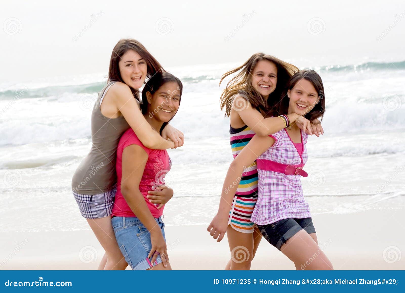 Girls piggyback stock image. Image of looking, holiday - 10971235