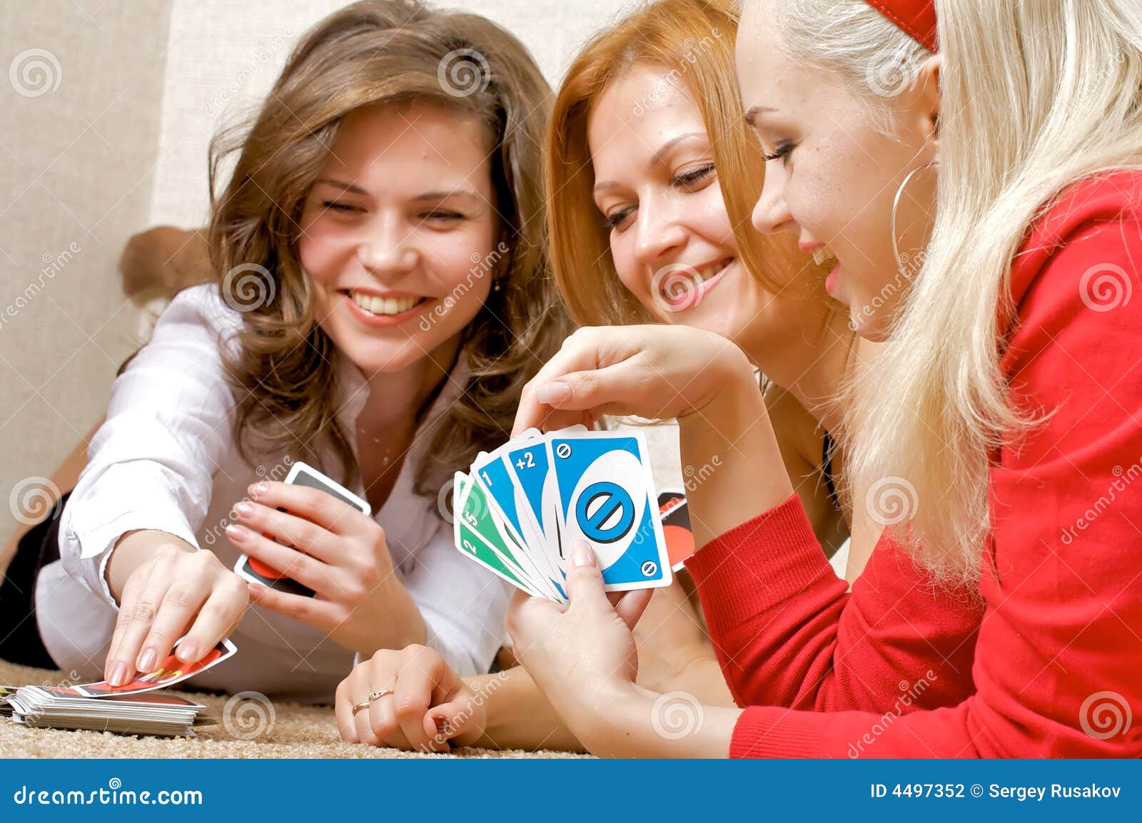 Girls playing cards stock photo. Image of house, enjoying - 4497352