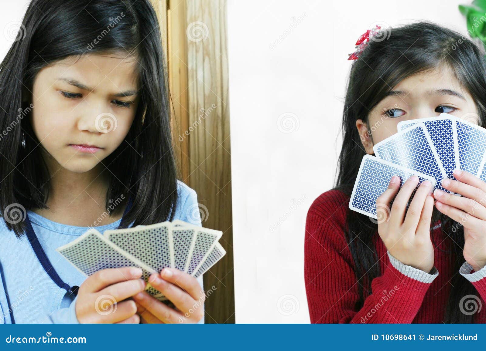 Girls Playing Cards, One is Cheating Stock Image - Image of looking ...