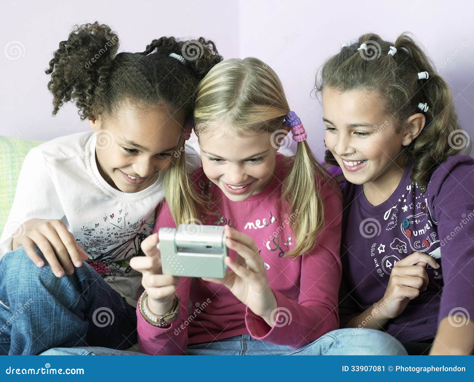 Girls Playing with Electrical Gadget Stock Image - Image of black ...