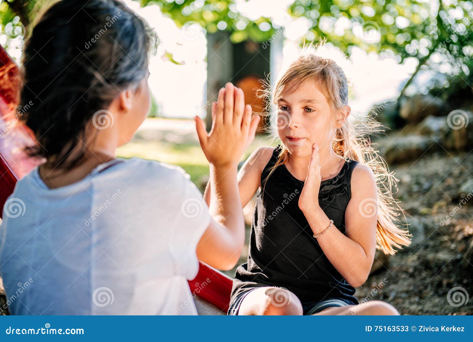 Girls Playing Hand Clapping Game Stock Image - Image of candid, outdoor ...