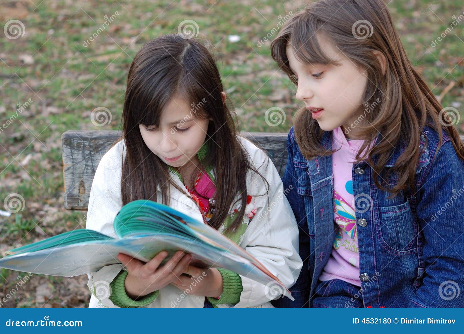 Two Girls Are Reading An Interesting Book Royalty-Free Stock Image ...