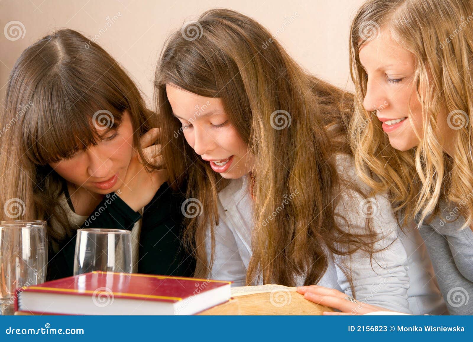 Girls Reading Together stock image. Image of beautiful - 2156823