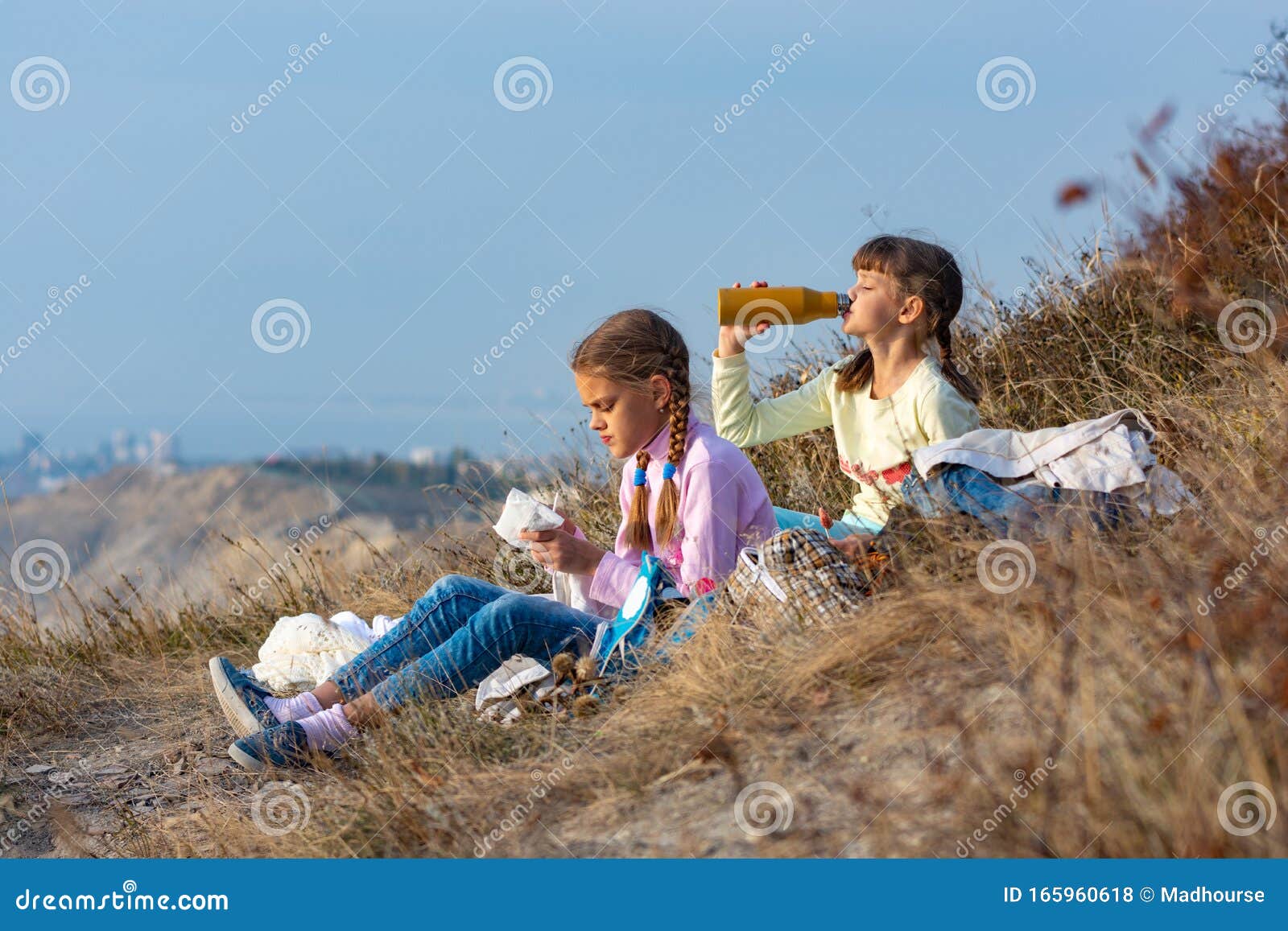 Girls on a Rest on a Halt and Drink Water Stock Photo - Image of girls ...