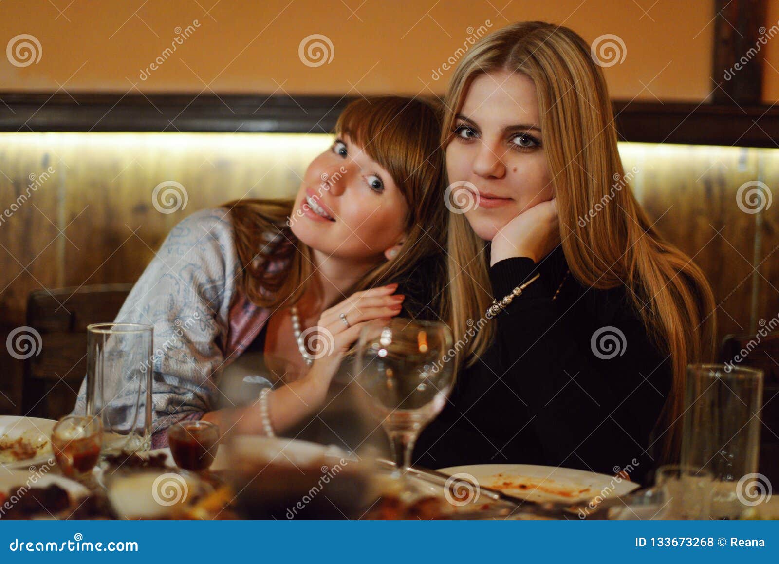 Girls in a restaurant stock photo. Image of girls, modern - 133673268