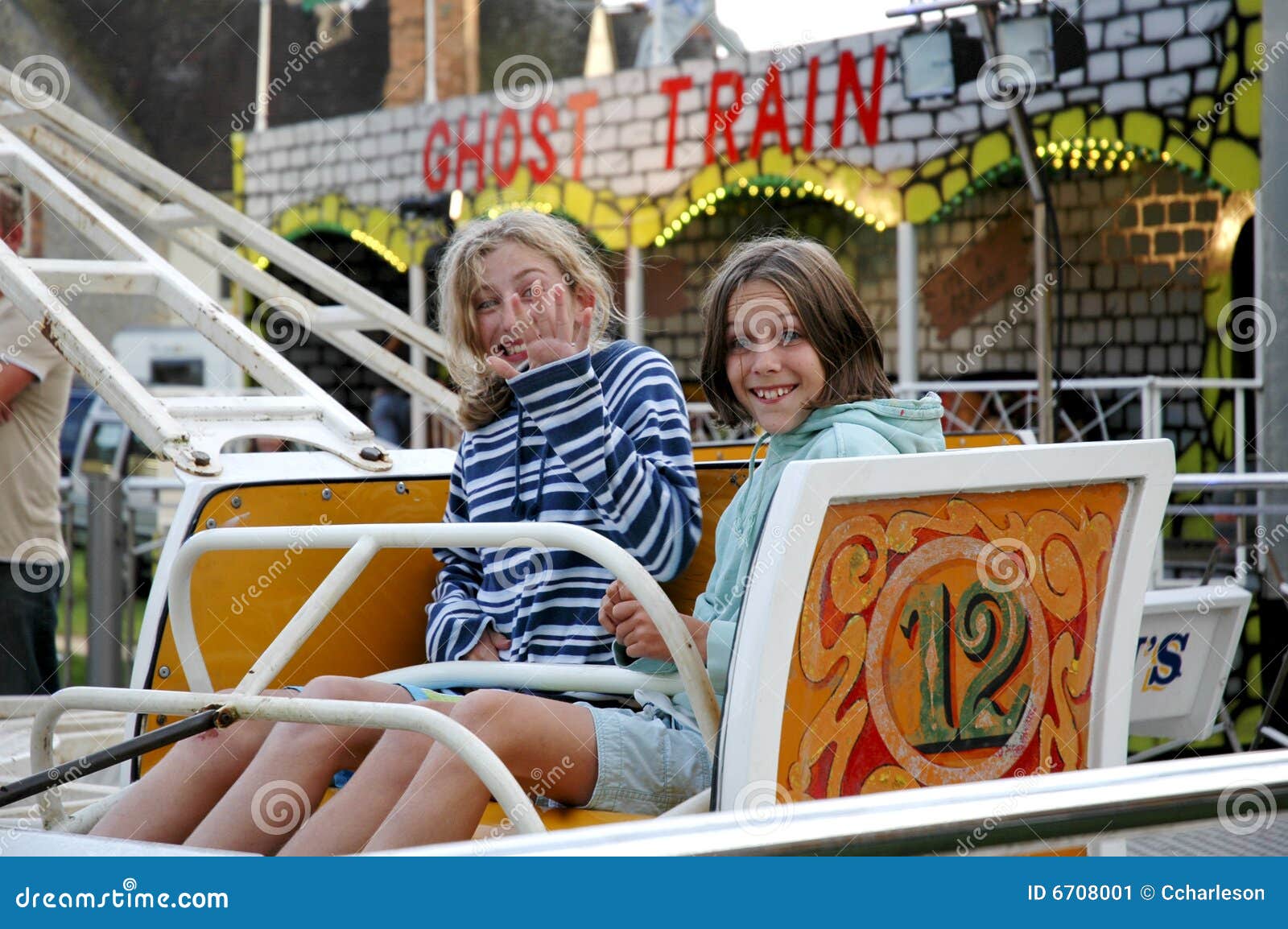 Girls on ride at fun fair stock image. Image of happy - 6708001
