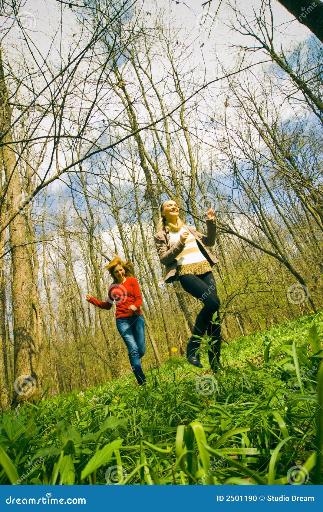 Girls Running through Forest Stock Photo - Image of together, forested ...