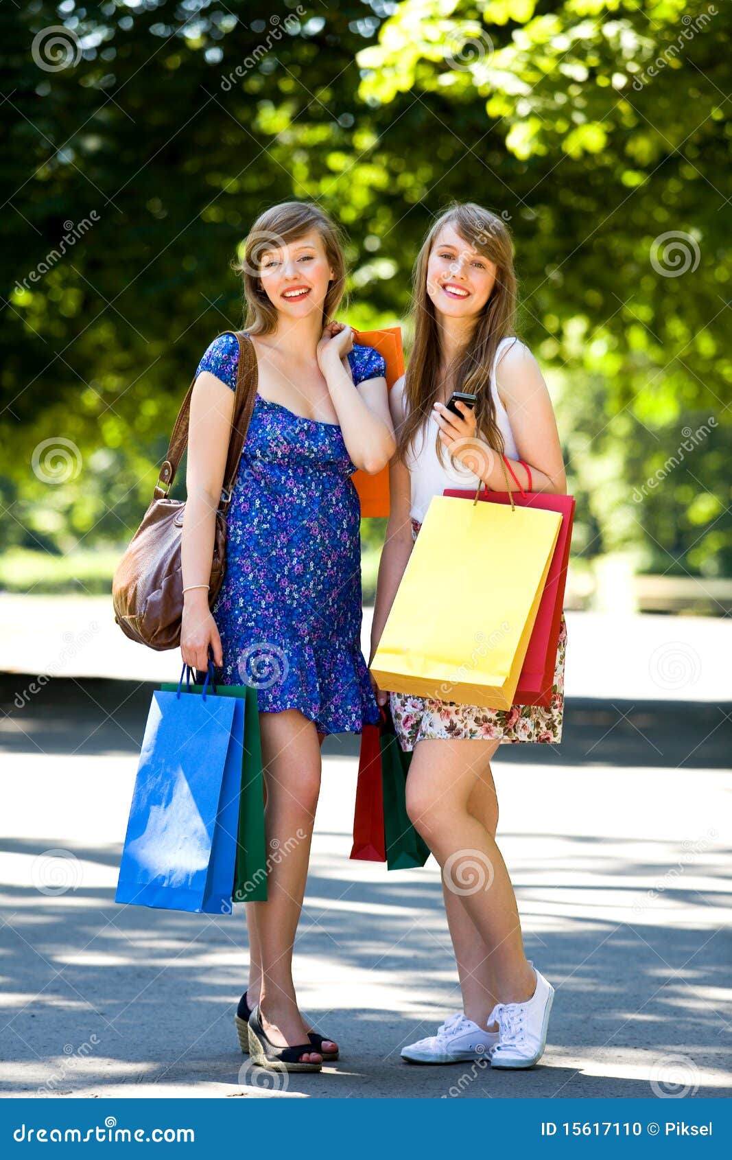 Girls with shopping bags stock photo. Image of casual - 15617110