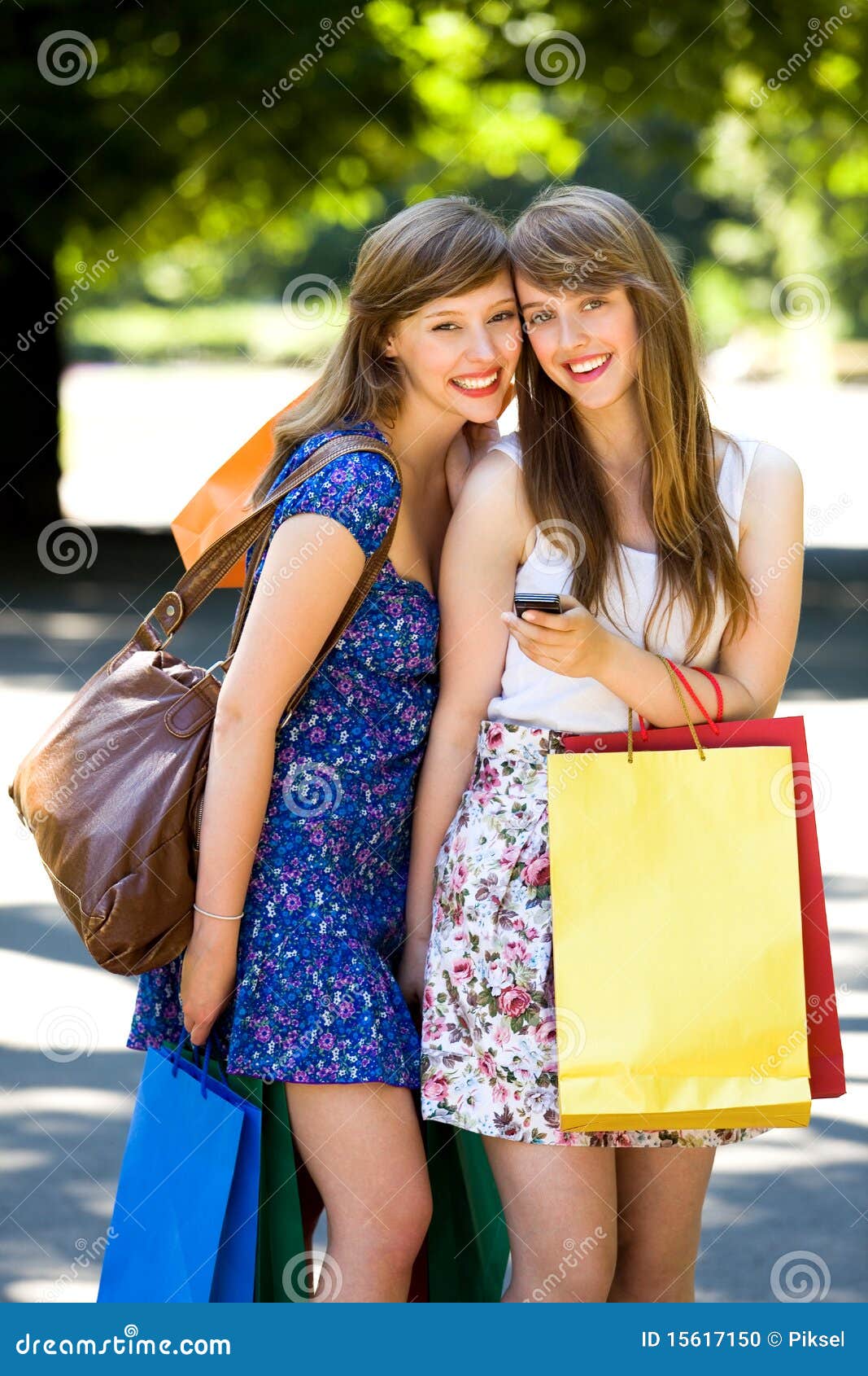 Girls with shopping bags stock photo. Image of carefree - 15617150