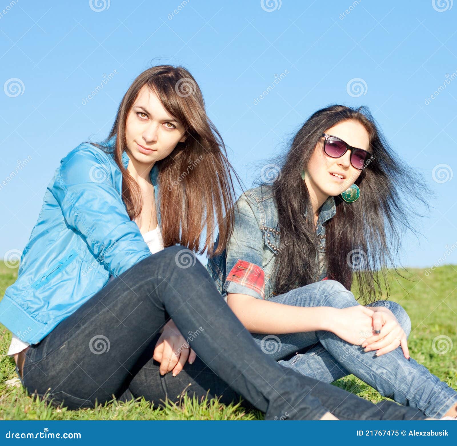 Girls Sitting Looking at Camera Stock Image - Image of attractive ...