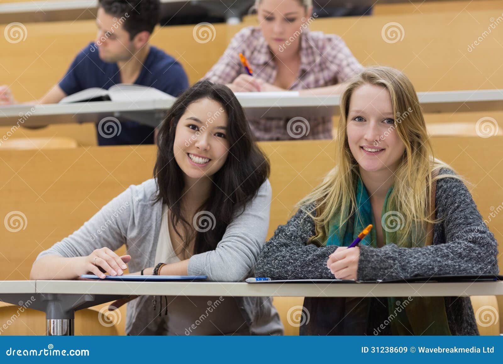 Girls Smiling in Lecture Hall with Tablet Pc Stock Image - Image of ...