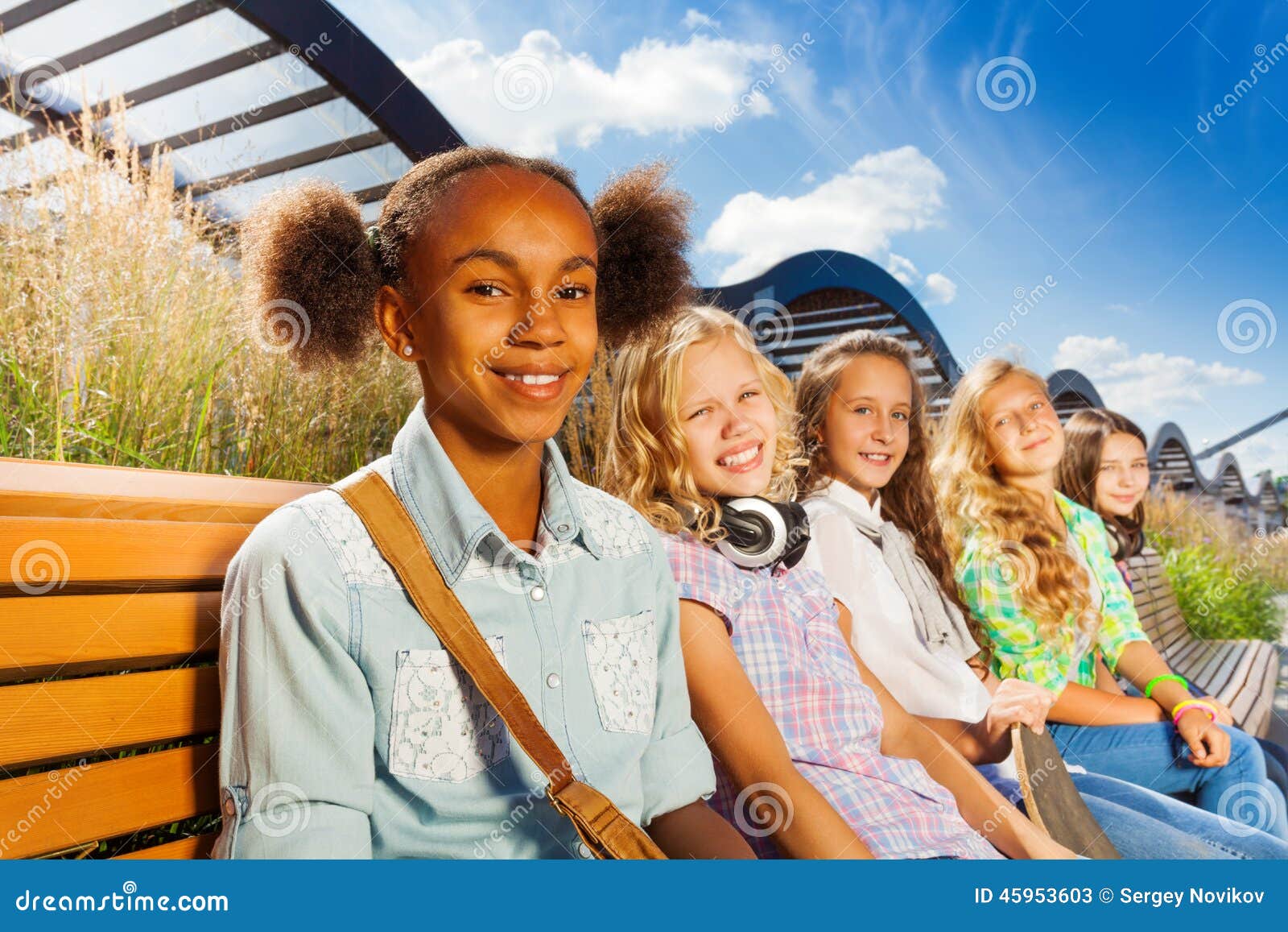 Girls Smiling and Sitting on the Bench in Summer Stock Image - Image of ...