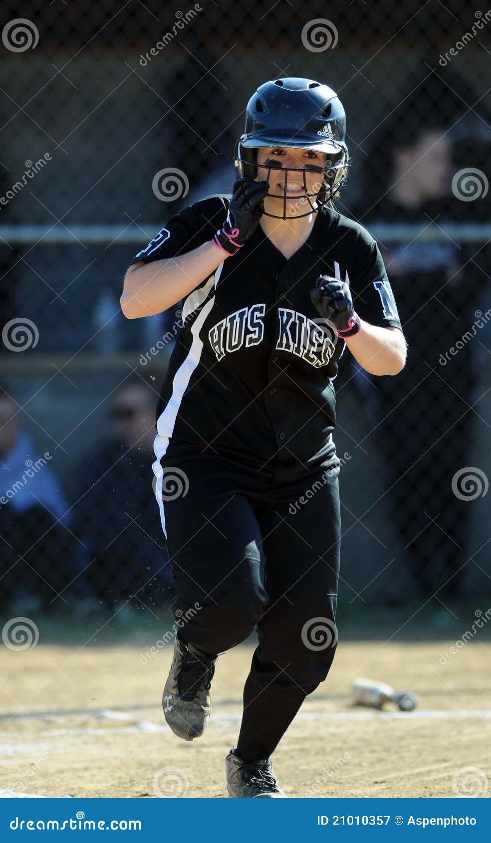 Girls Softball - Batter Runs To First Editorial Photography - Image of ...