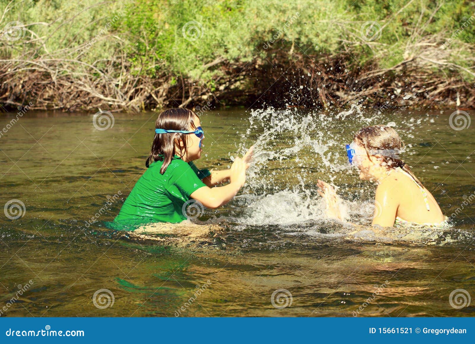 Girls Splashing in the River Stock Image - Image of playing, outside ...