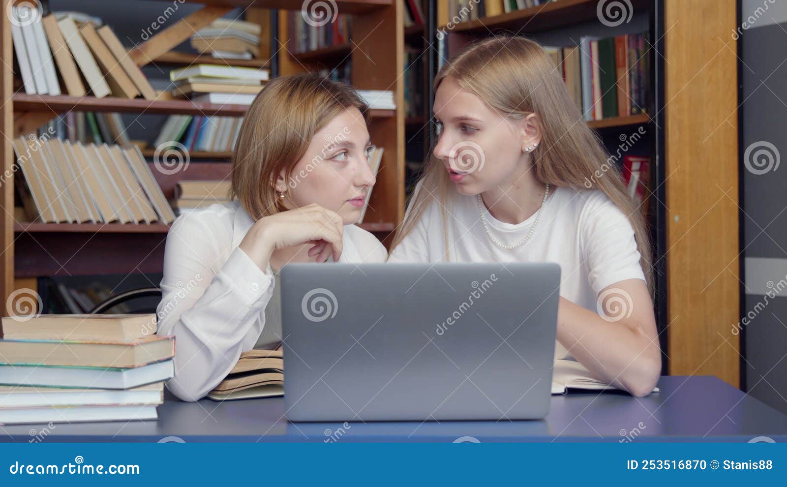 4K. the Girls Study Together in the Library. Students Prepare for Exams ...
