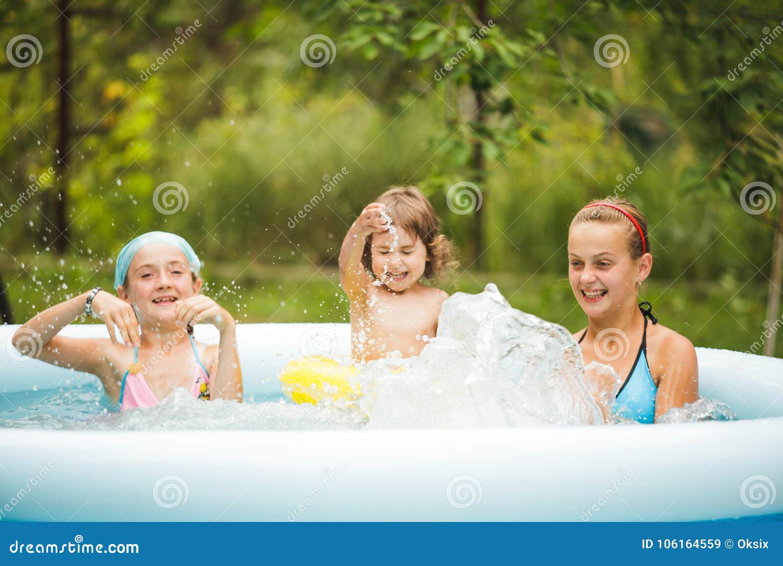 Girls in swimming pool stock image. Image of happy, beautiful - 106164559