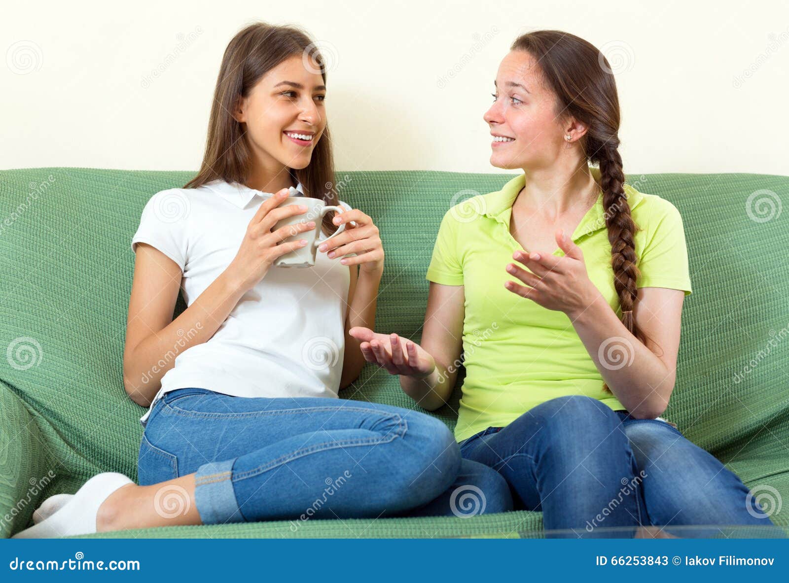 Girls talking on a couch stock image. Image of room, leisure - 66253843