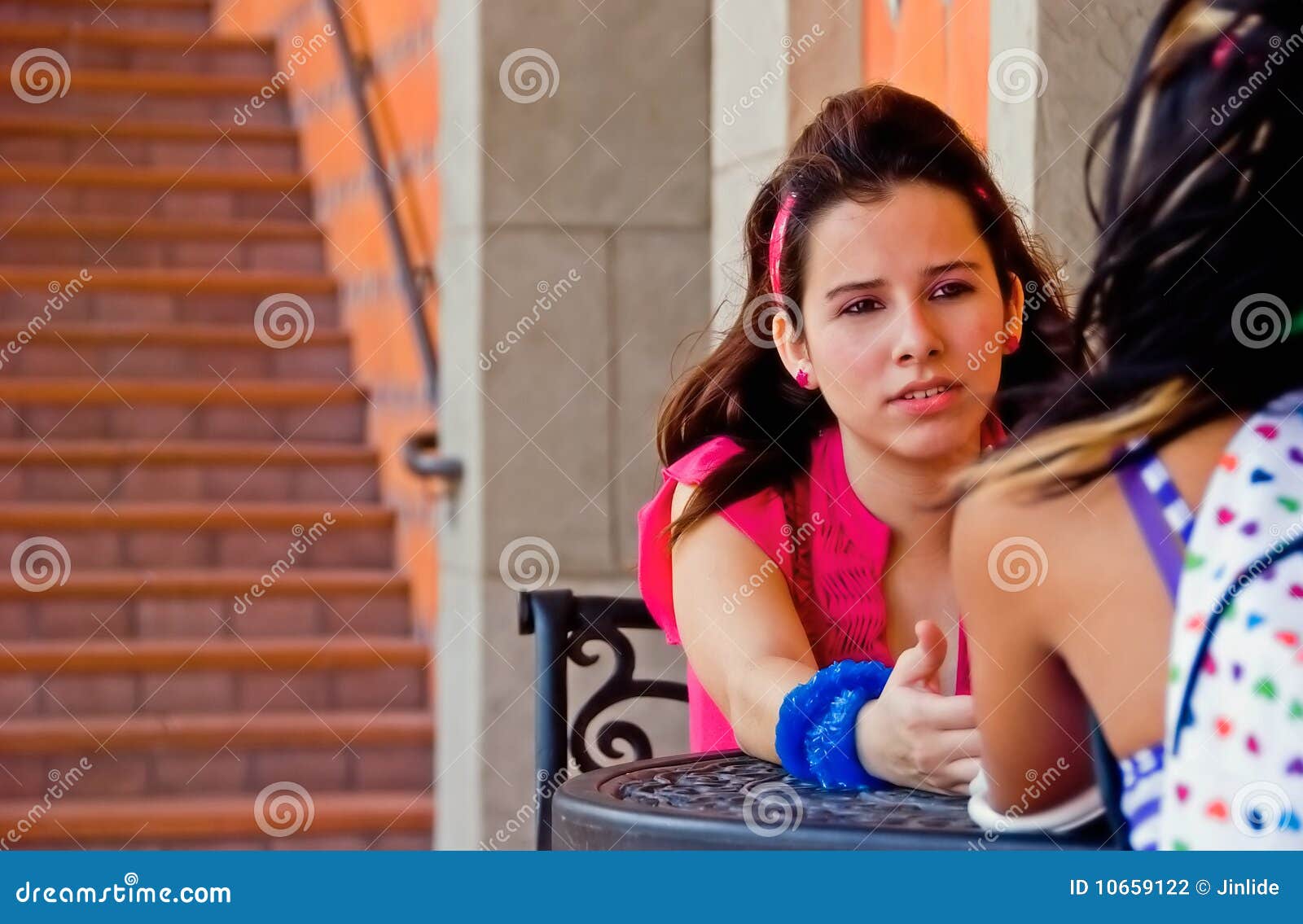 Girls talking near stairs stock photo. Image of talk - 10659122