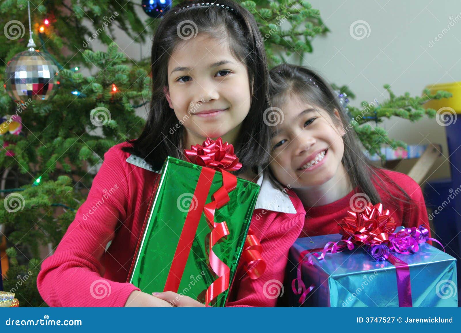 Girls with their presents stock image. Image of multiethnic - 3747527