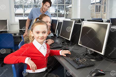 Girls Using Computers in School Class Stock Image - Image of girls ...