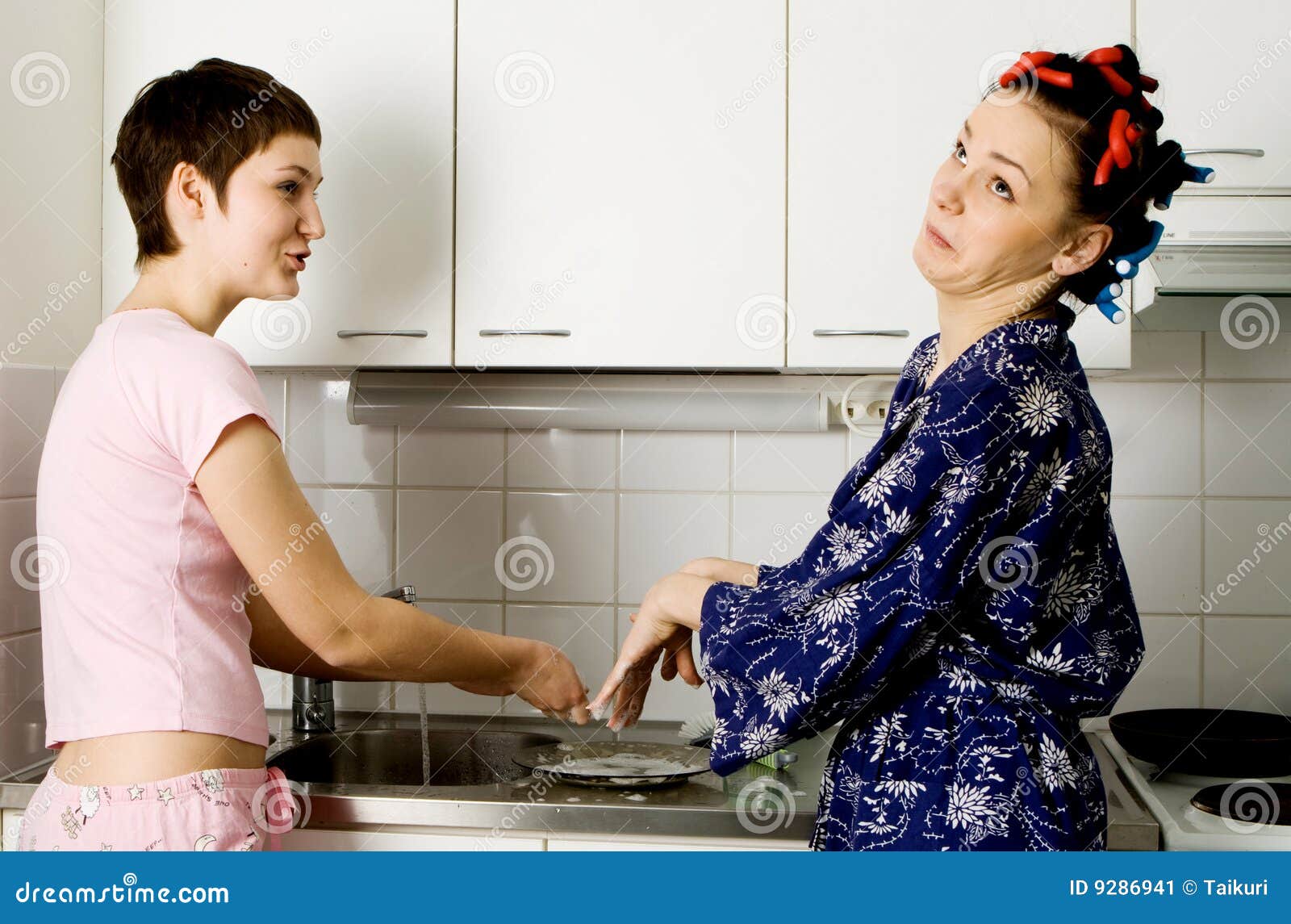 Girls Washing the Plate stock image. Image of home, stereotypical - 9286941