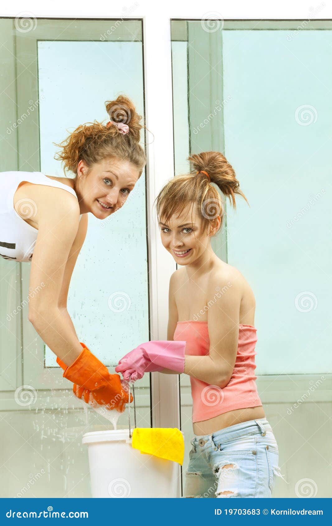 Girls washing the window stock image. Image of holds - 19703683