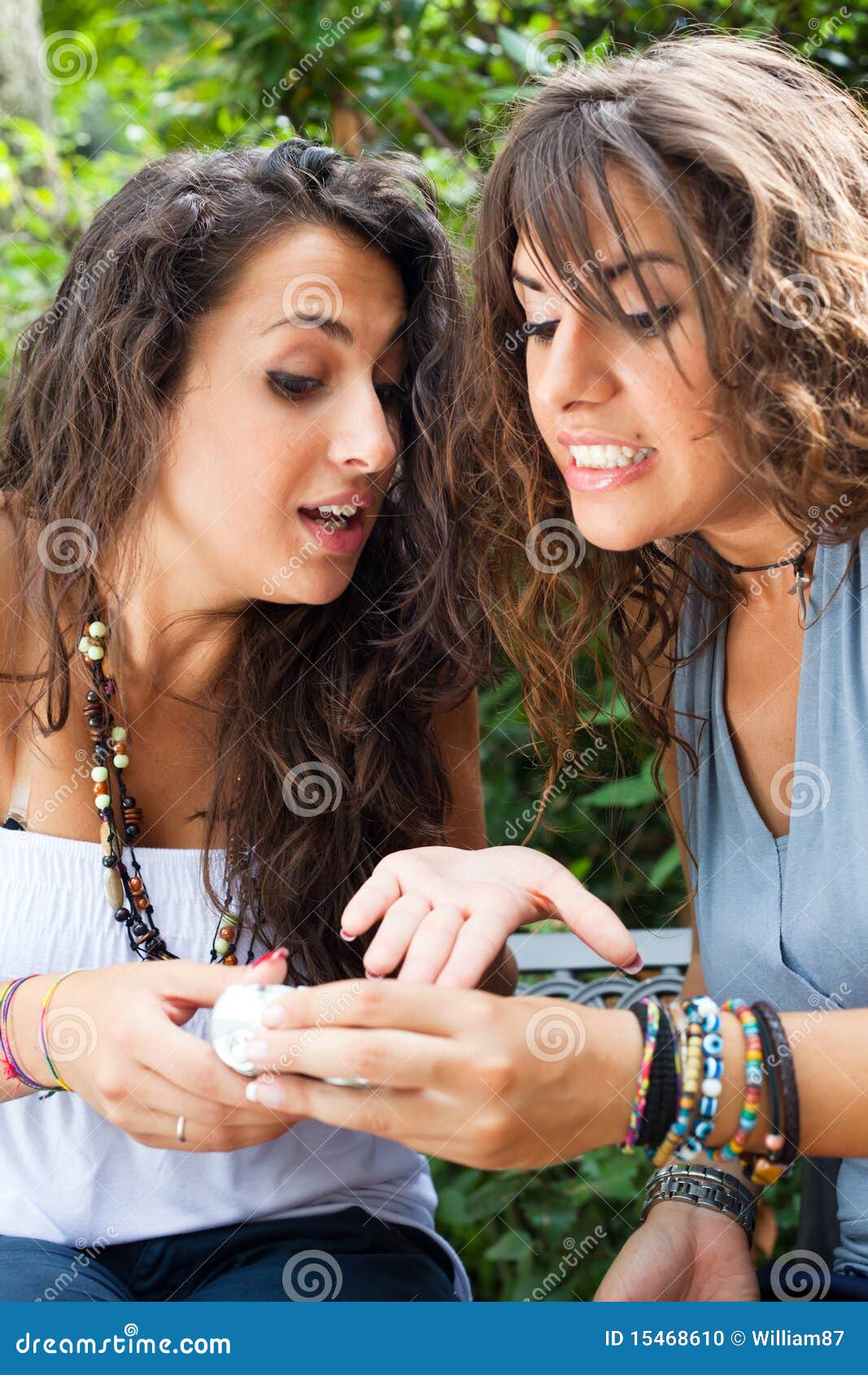 Girls watching photos stock photo. Image of look, camera - 15468610