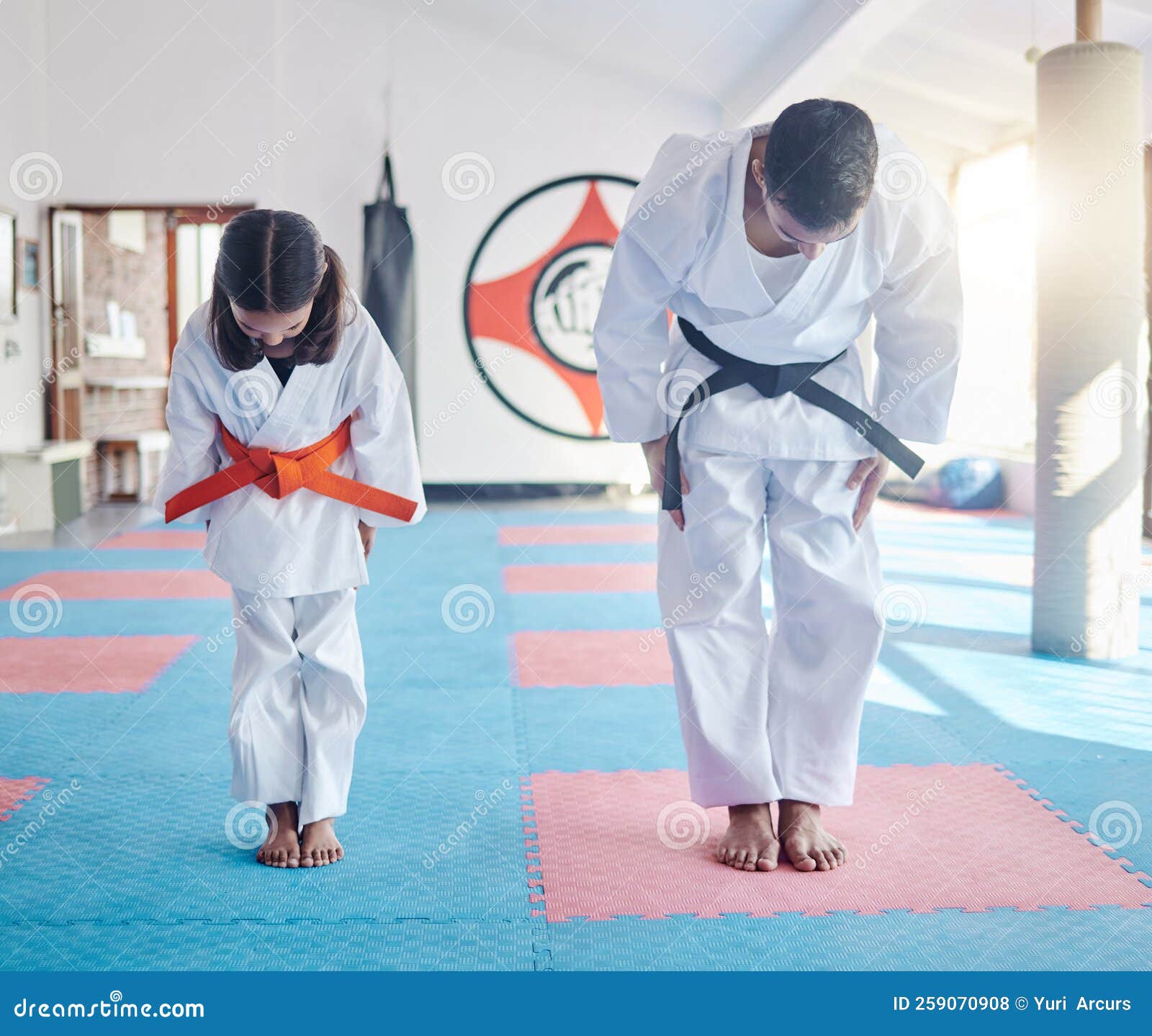 Give Respect, Get Respect. a Young Man and Cute Little Girl Practicing ...