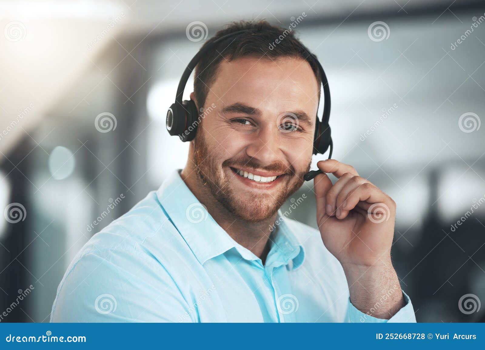 Give Us a Call If You Need Help. a Young Call Centre Agent Sitting ...